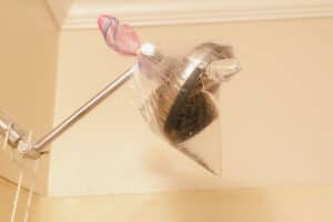 How to Easily Clean Calcium Buildup in Your Shower - Our Oily House