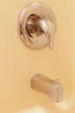 How to Easily Clean Calcium Buildup in Your Shower - Our Oily House